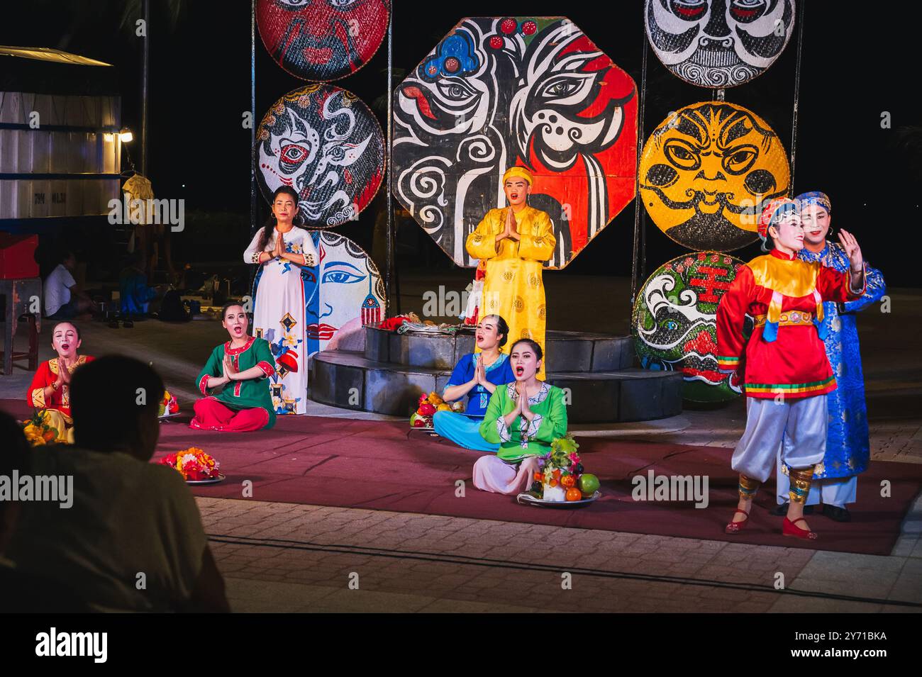 Asian street theater festive performance with Vietnamese people in ...