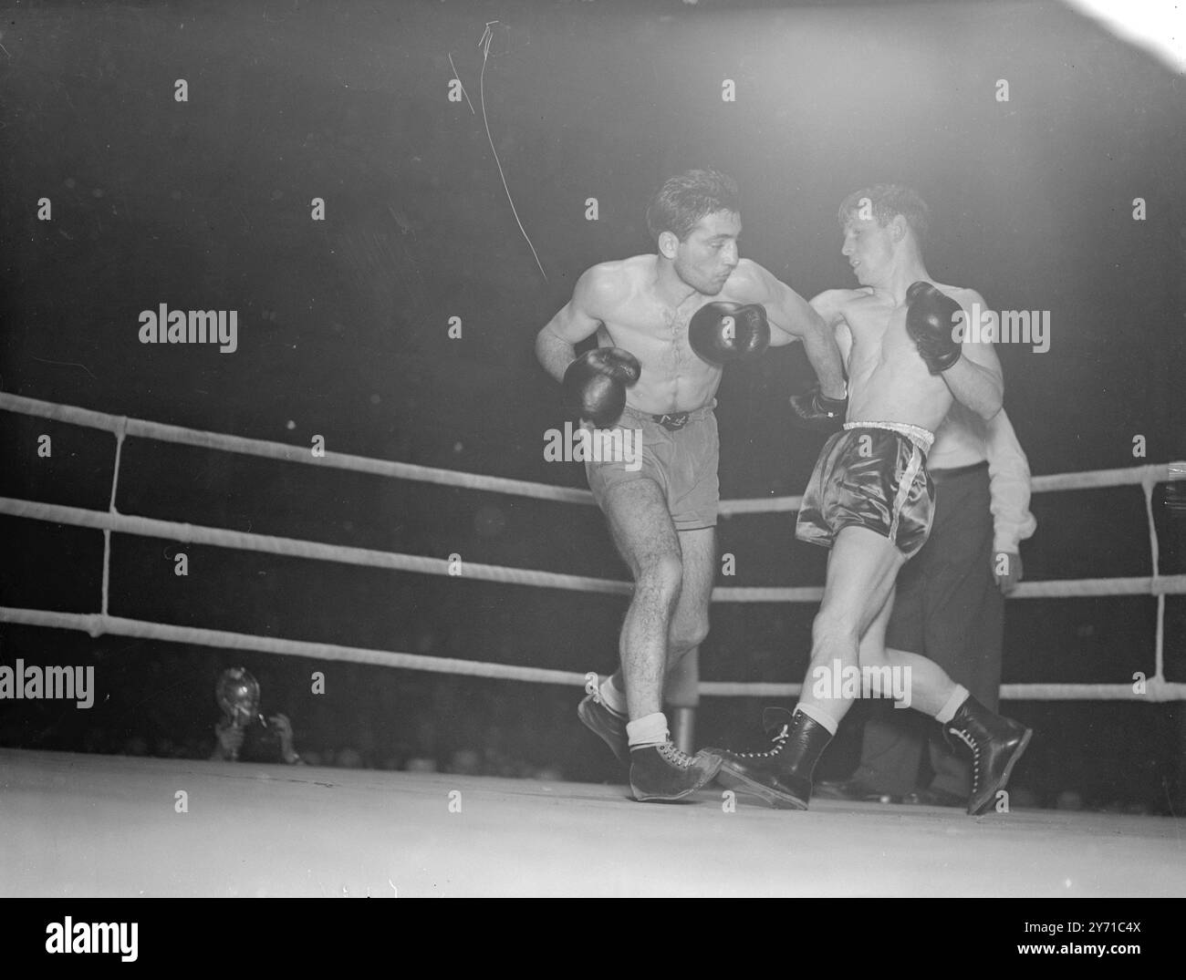 ITALIAN '' SURRENDERS '' WITH INJURED HAND GUIDO FERRANCIN , the ...