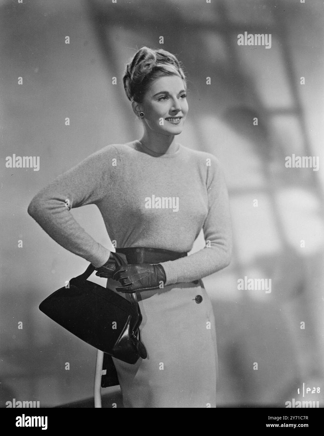 Leading woman in beige hi-res stock photography and images - Alamy