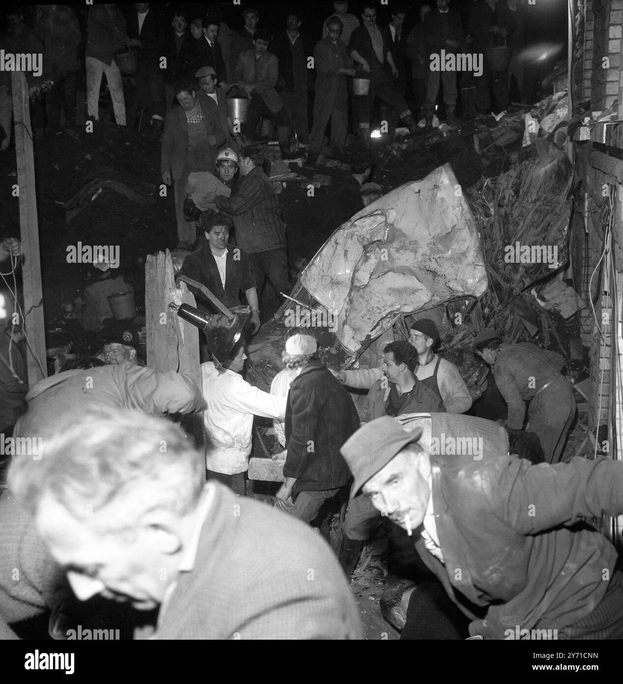 Aberfan disaster 1966 A chain of miners and rescue workers , continued ...