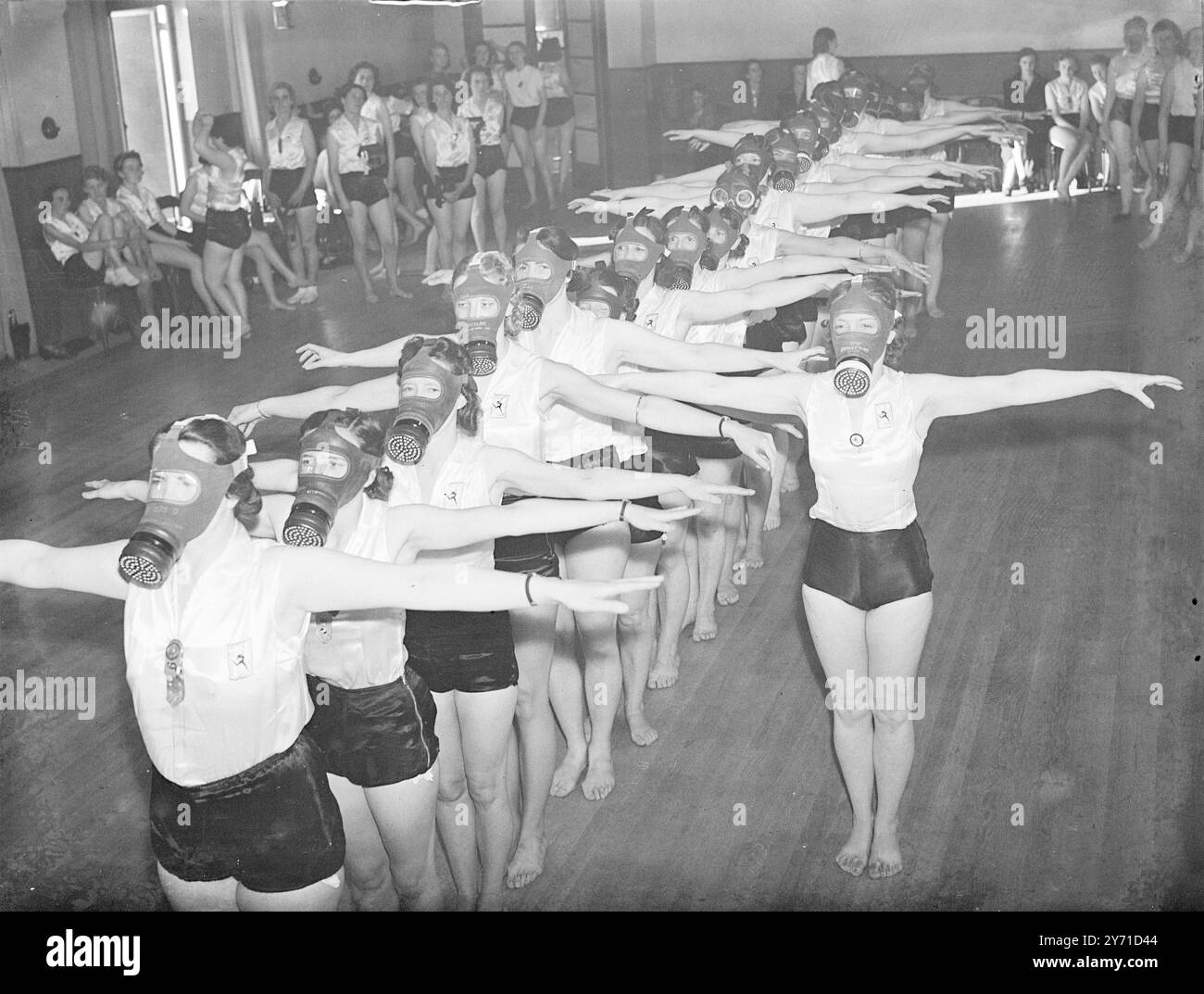 Women of the League of Health and Beauty demonstrating exercises whilst ...