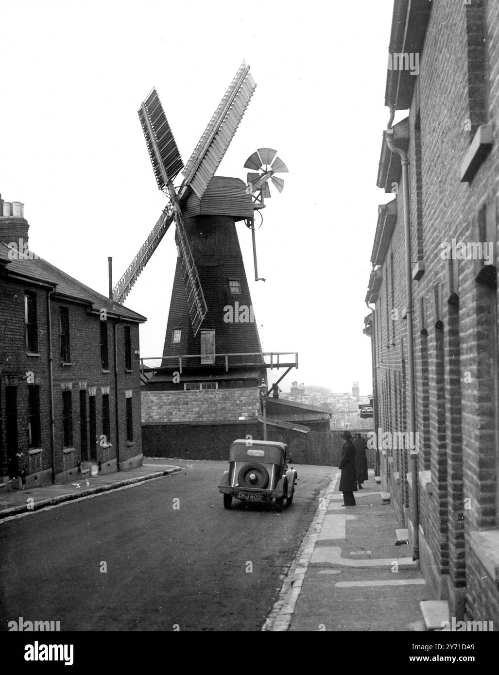 Pedestrian wind Black and White Stock Photos & Images - Alamy
