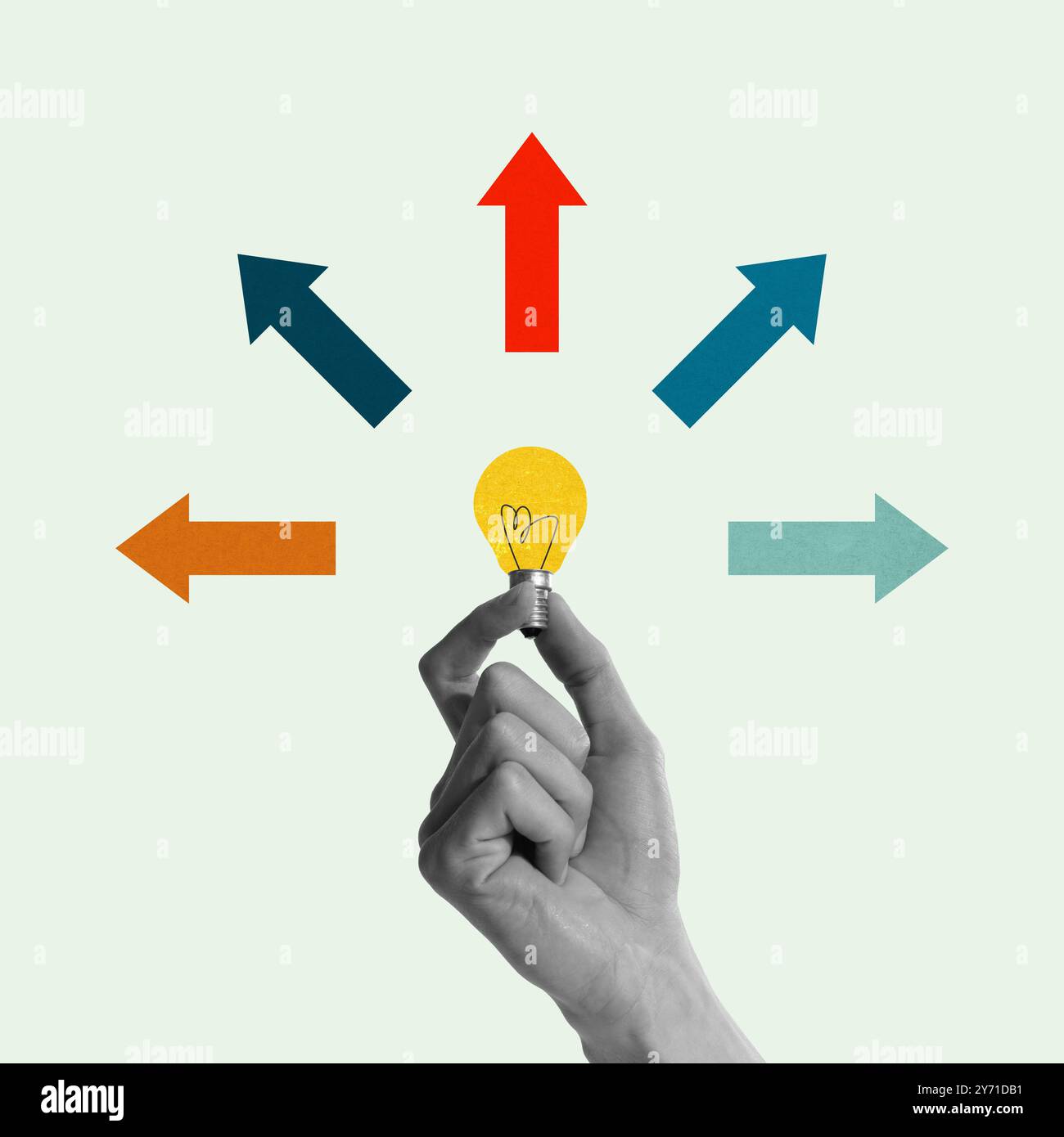 Hand holding glowing lightbulb with multicolored arrows pointing in multiple directions ...