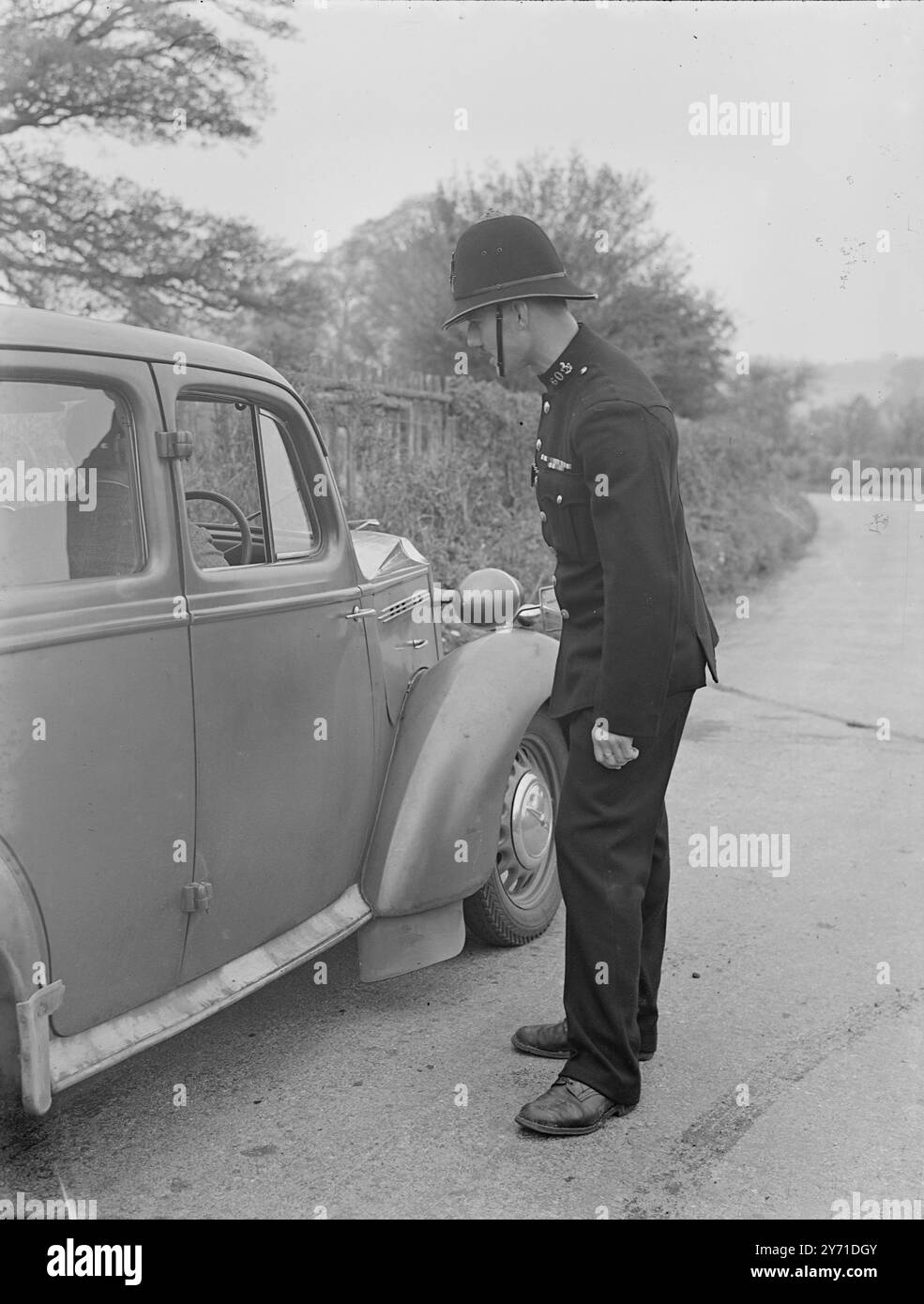 Policeman giving directions hi-res stock photography and images - Alamy