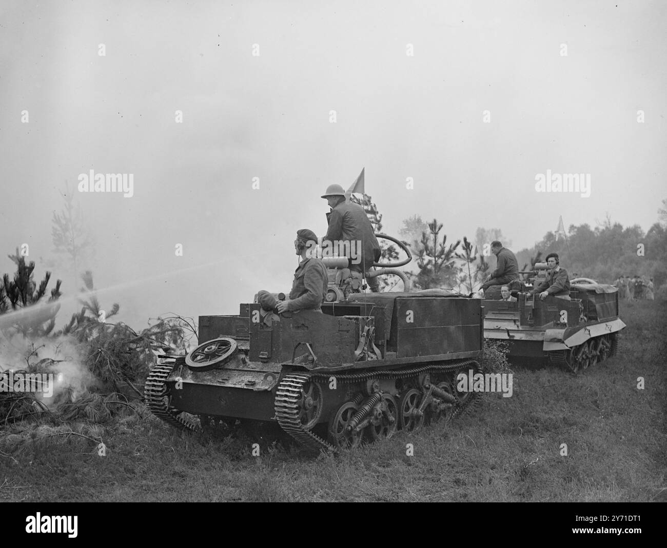 "DOWN IN THE FOREST" WOMEN WILL FIGHT FIRES. Bren-gun carrier "fire ...