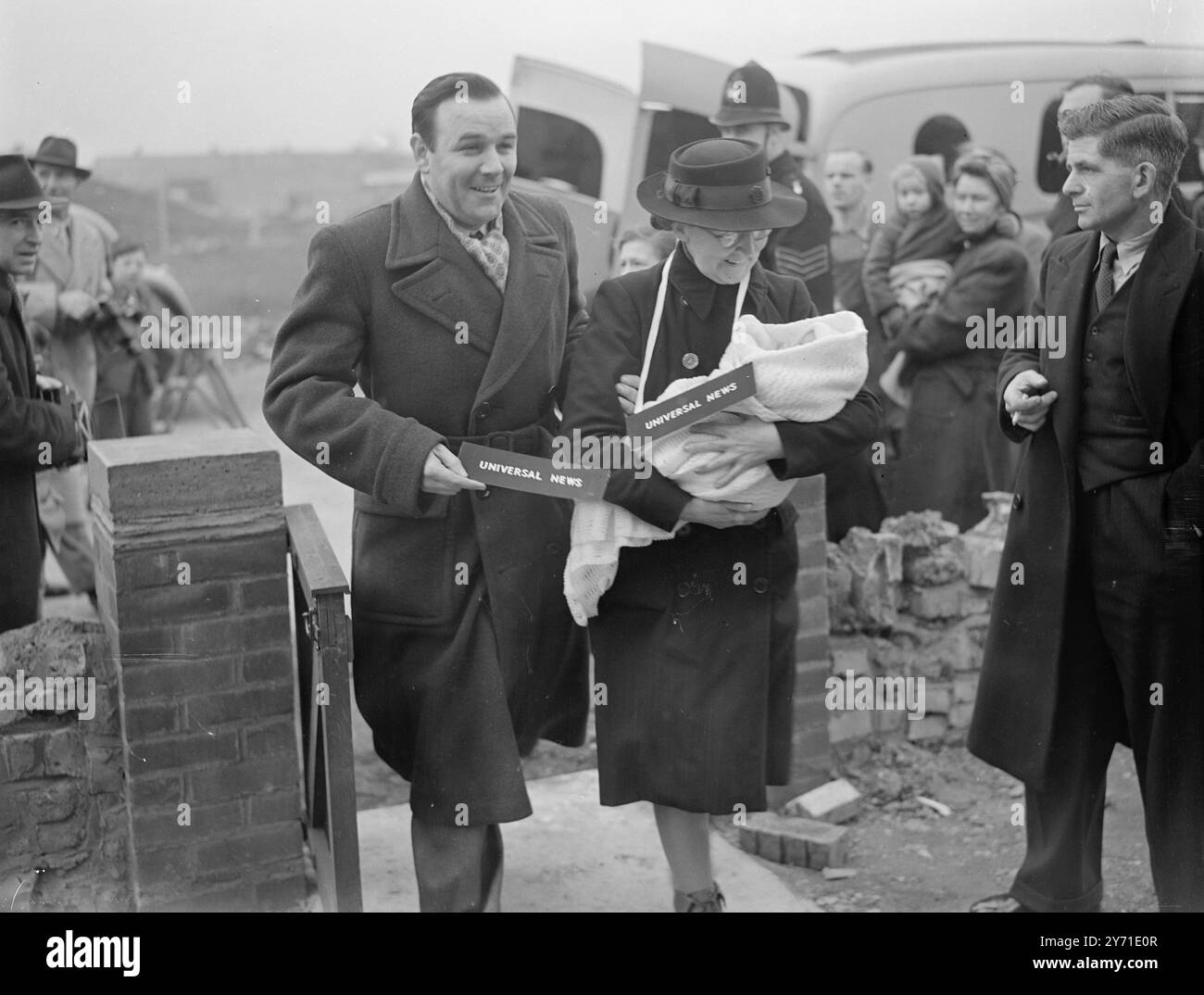 EDMONTON QUADS WENT HOME A nurse is seen with one of the quads born is ...