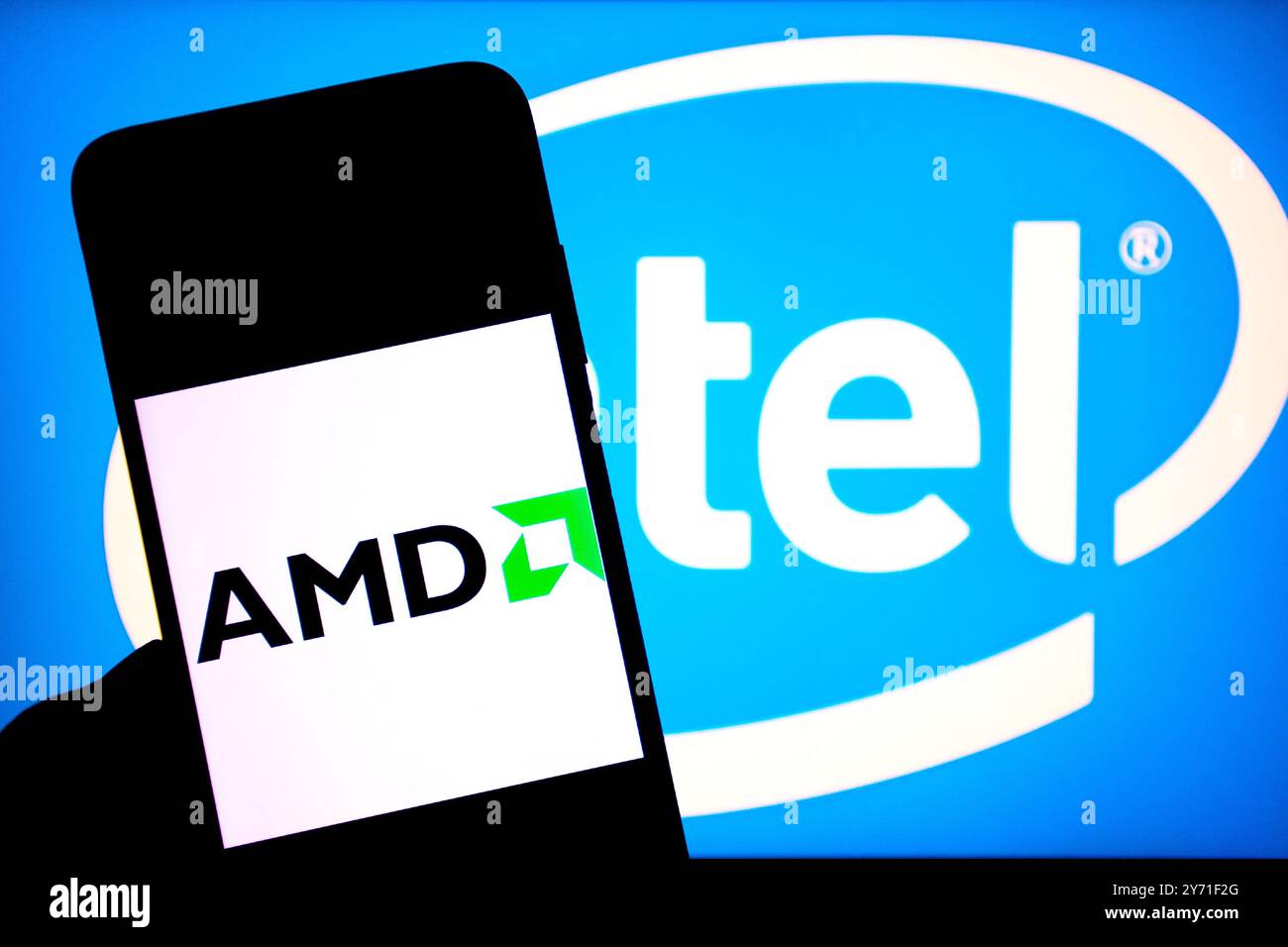 In this photo illustration, an AMD logo seen displayed on a smartphone ...