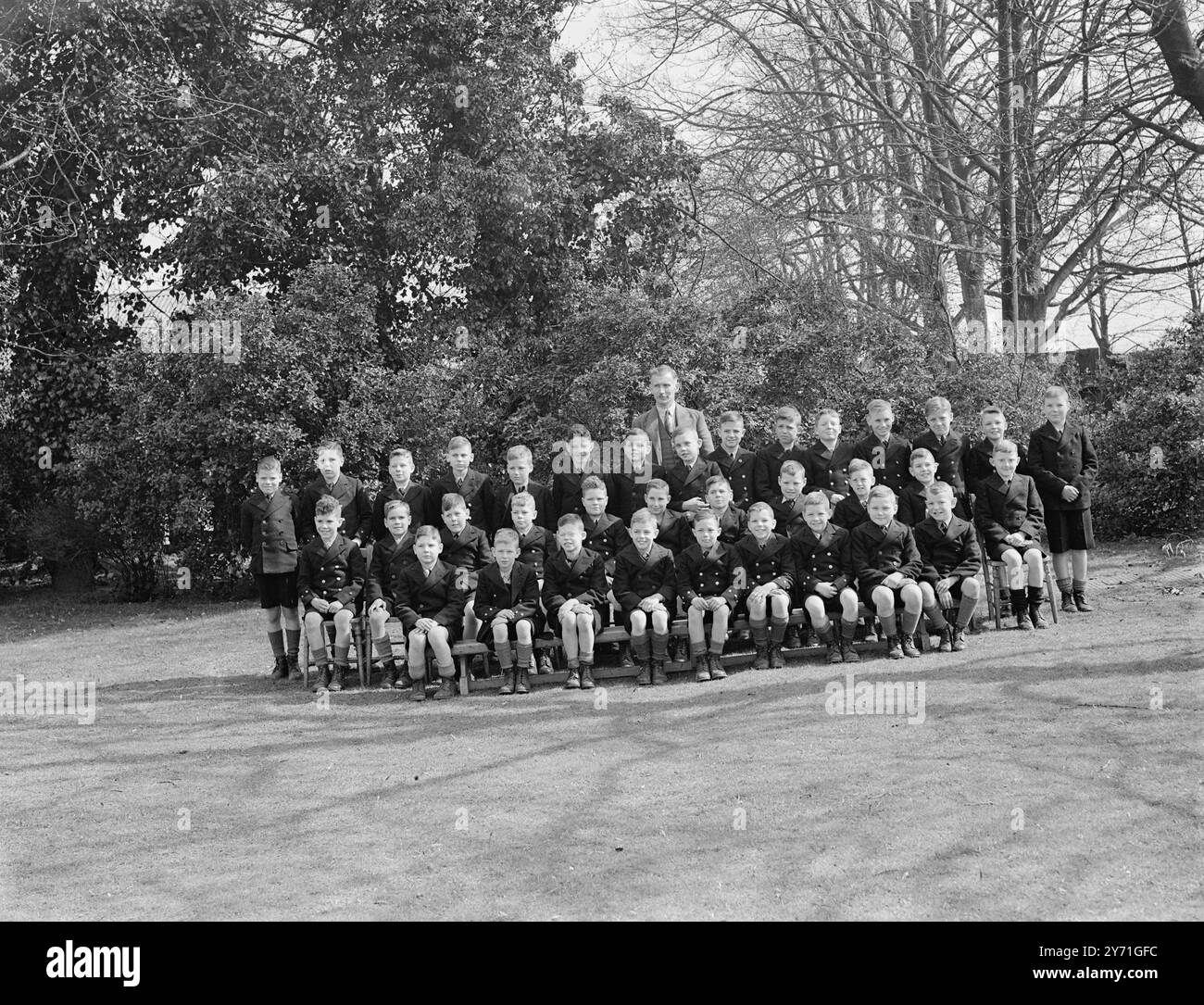 Group boys outside school Black and White Stock Photos & Images - Alamy