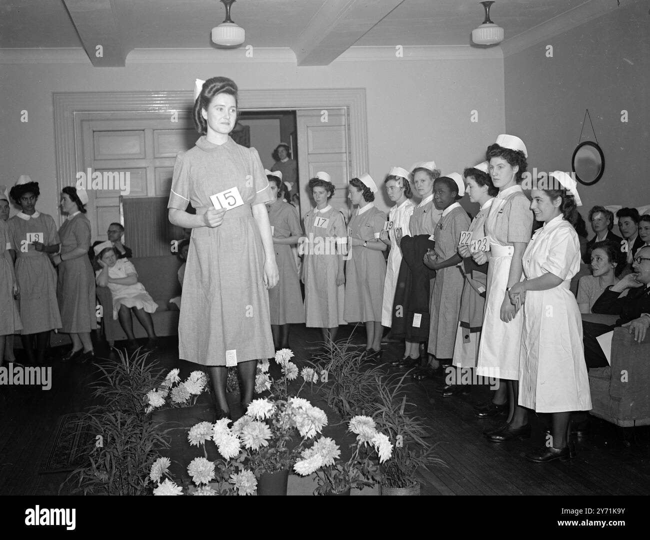 NURSES AS MANNEQUINS DISPLAY THEIR BRIGHTER UNIFORMS - - - - An effort ...