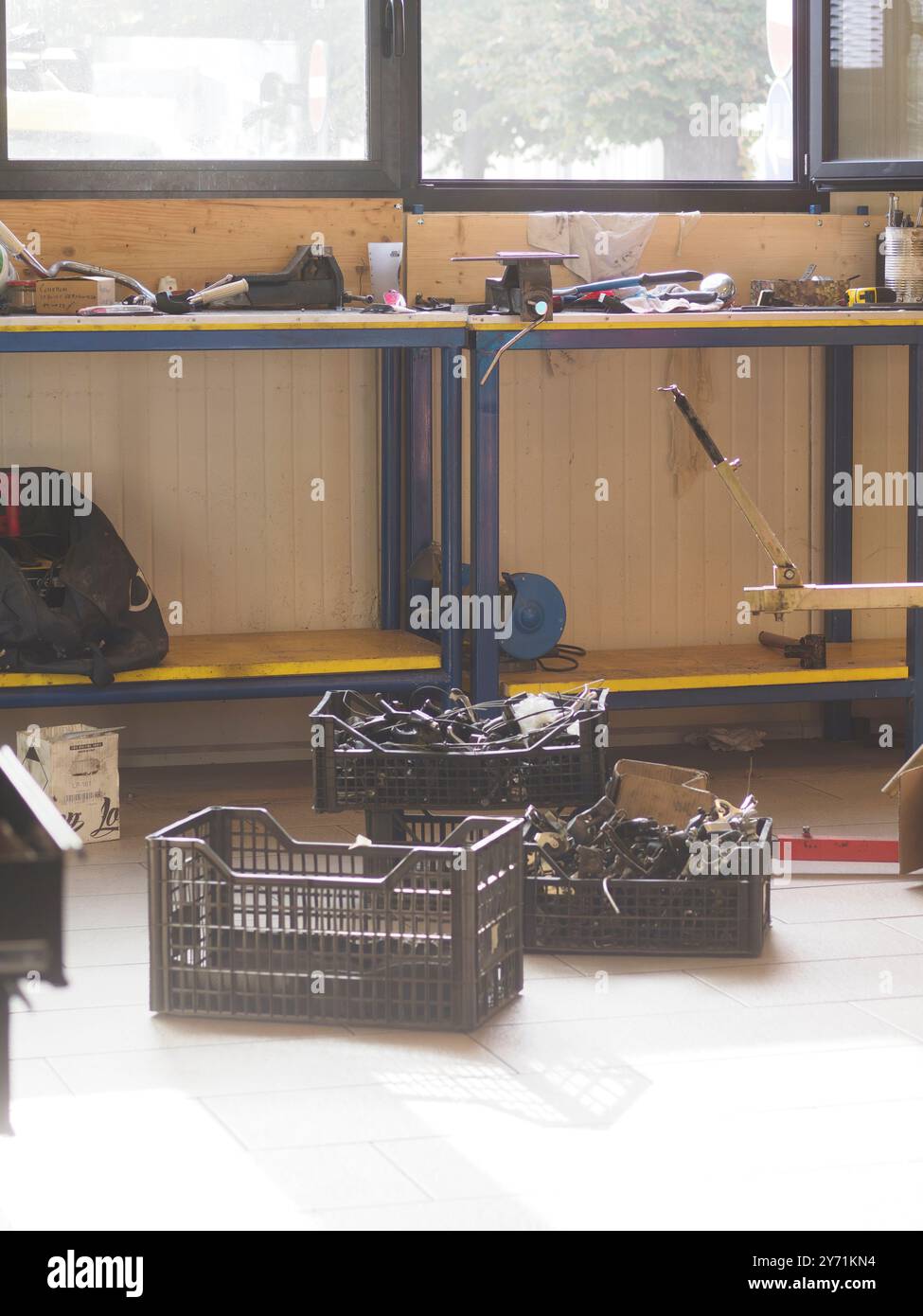 Cremona, Italy - september 19th 2023 Messy bicycle workshop with tools ...