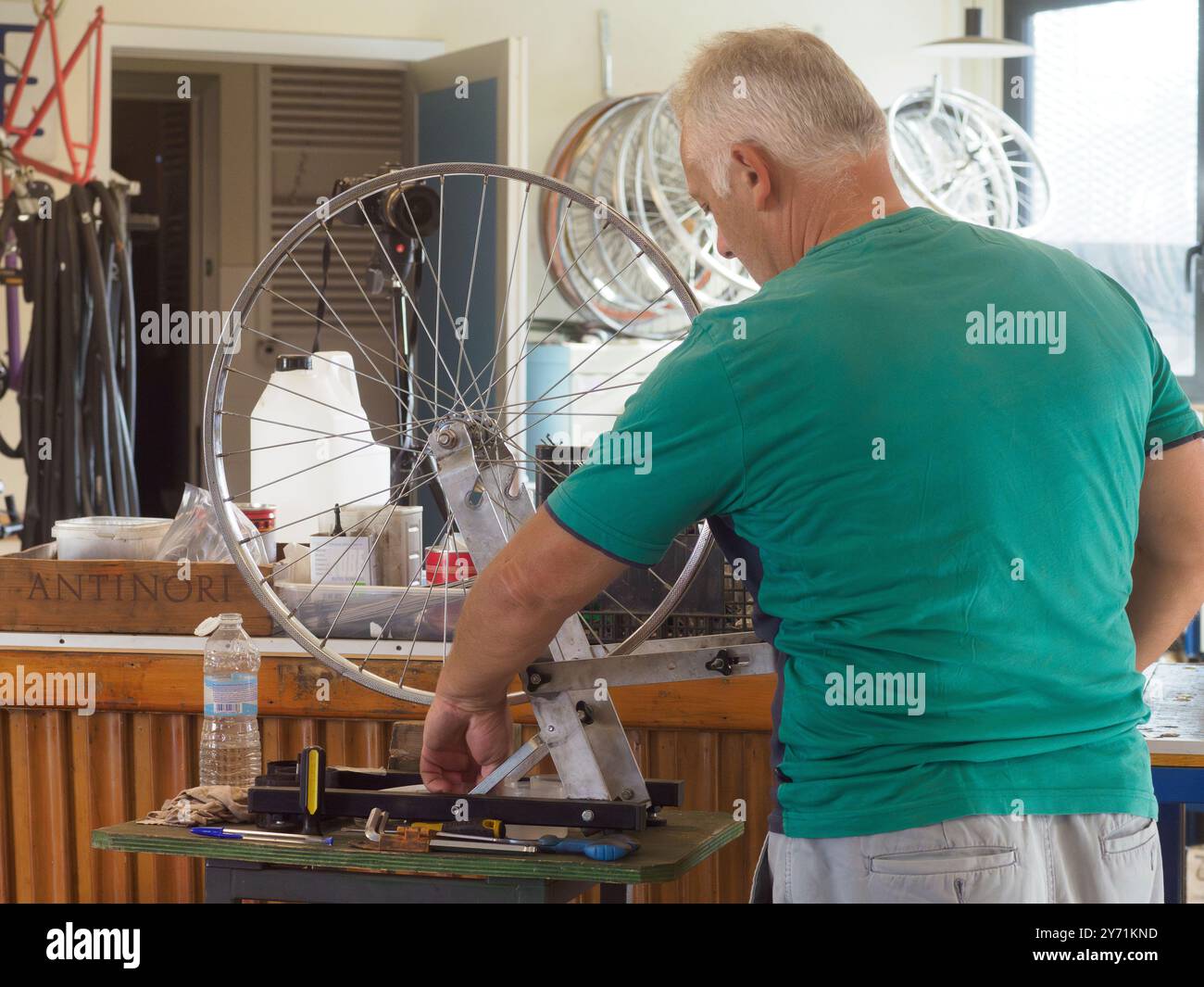 Cremona, Italy - september 19th 2023 Bicycle mechanic using different ...