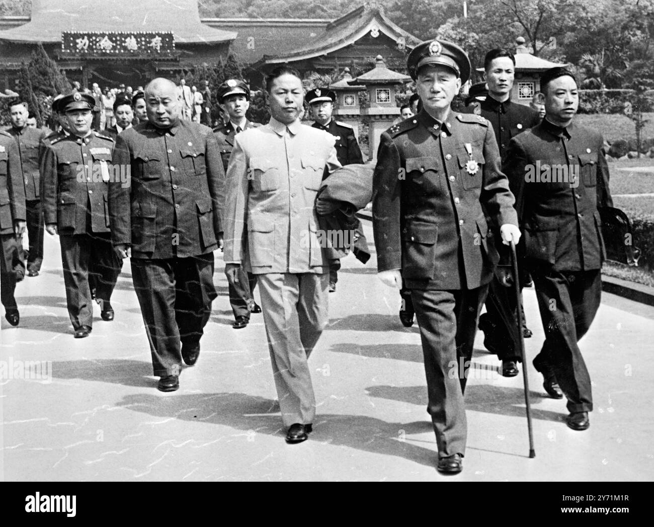 Chiang remembers war dead. Accompanied by members of his government ...