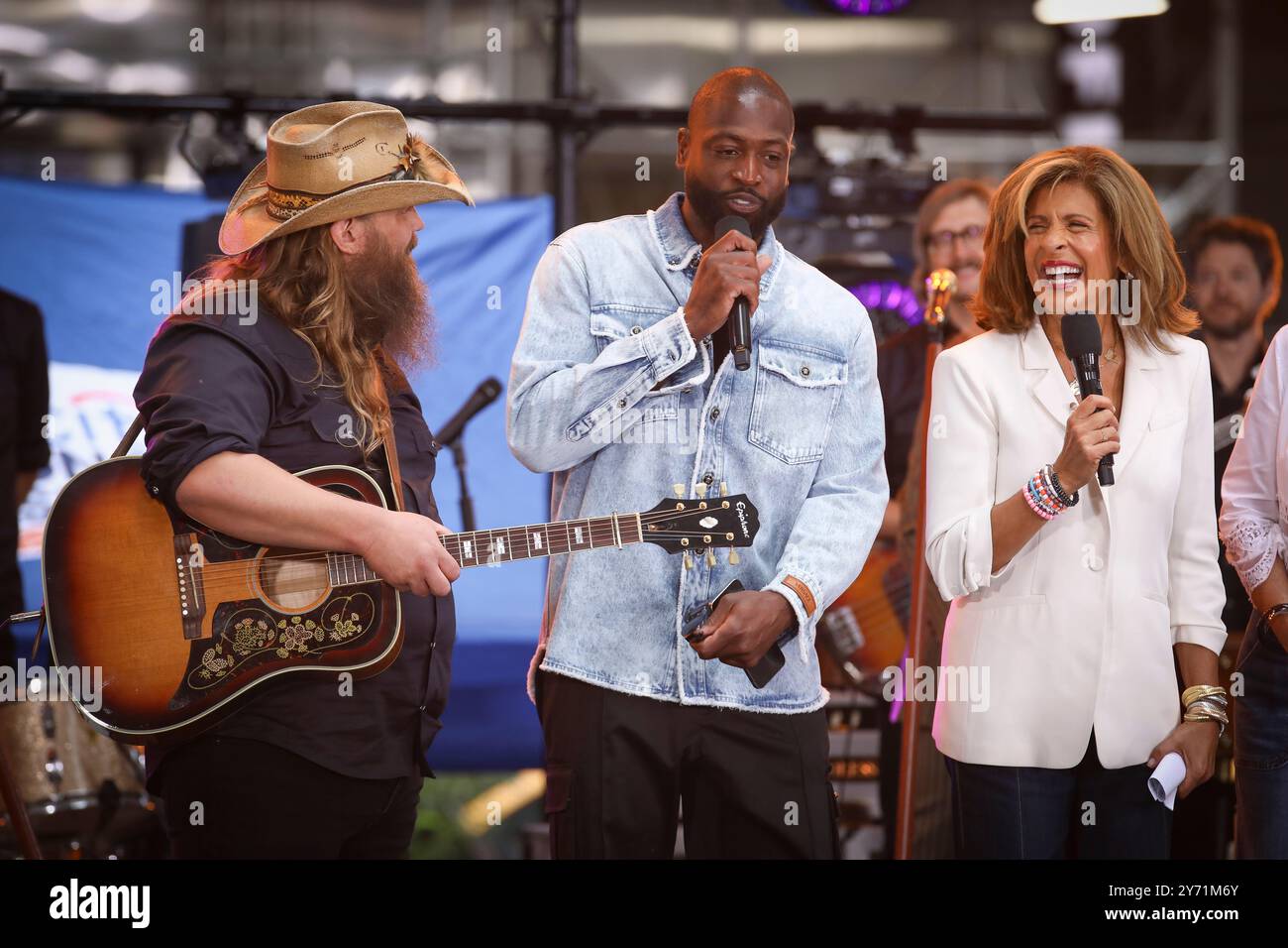 Singer-songwriter Chris Stapleton, from left, former basketball player ...