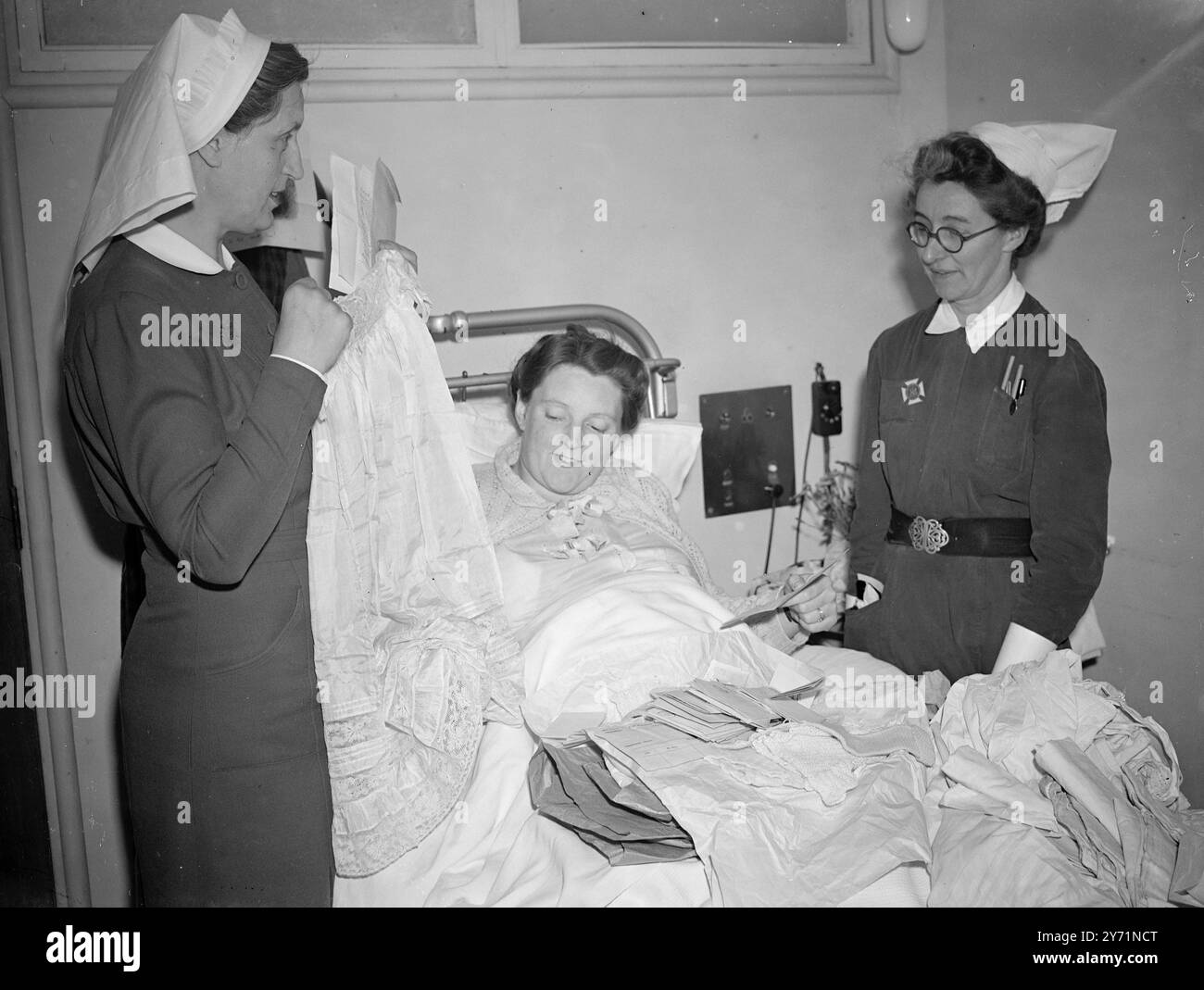 Mother in the News Surrounded by letters and parcels, Mrs Good, mother ...