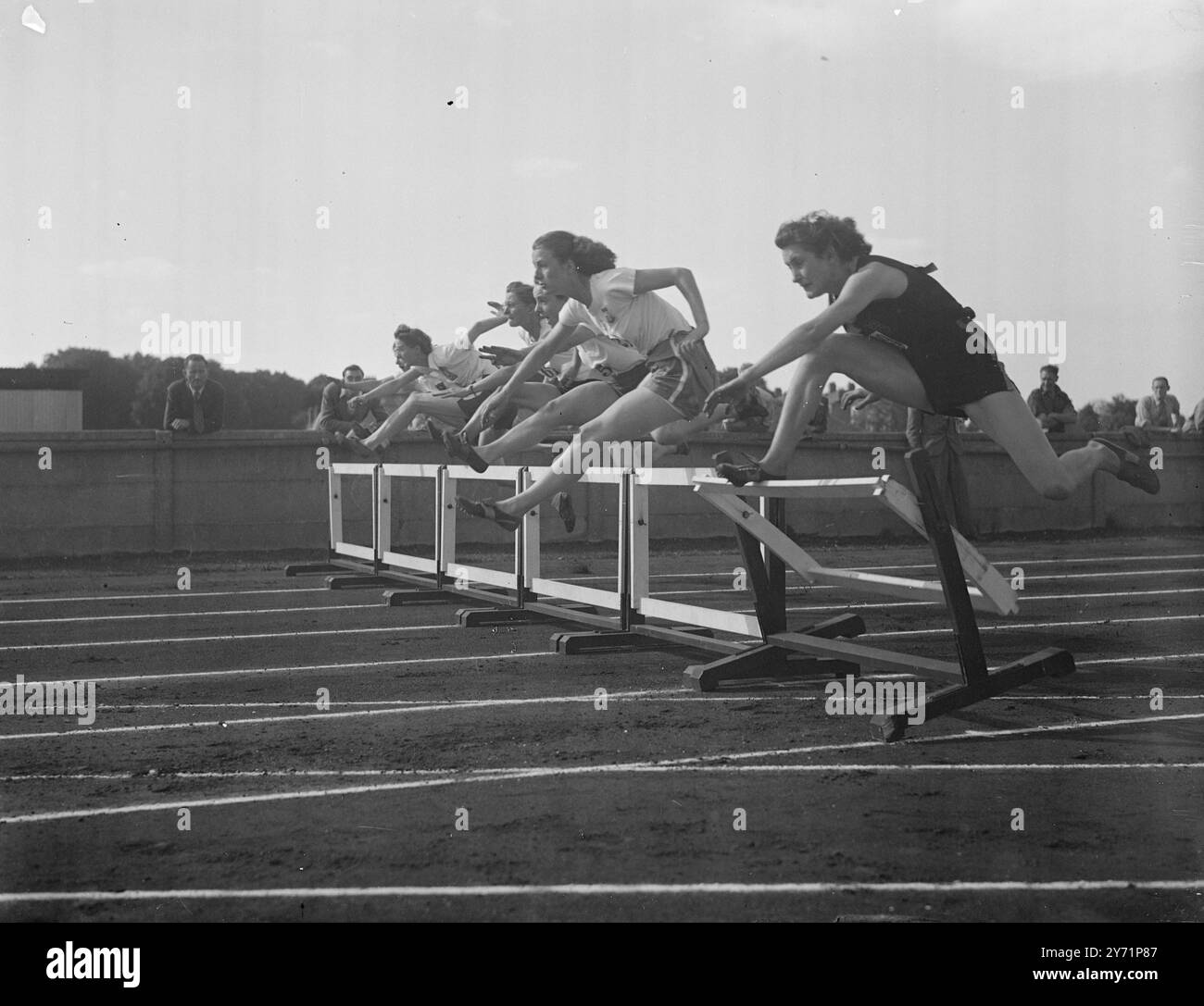"Over they go" - W.A.A.A. Championships These six hurdlers in the 80 ...
