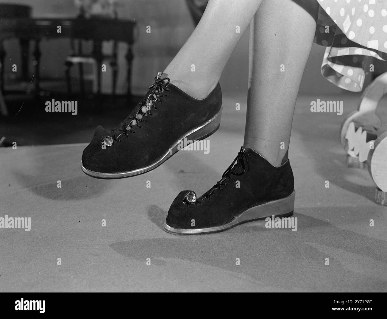 Curling shoes Black and White Stock Photos & Images - Alamy