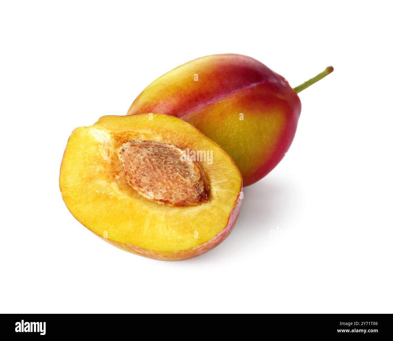 Whole and cut ripe plums isolated on white Stock Photo - Alamy