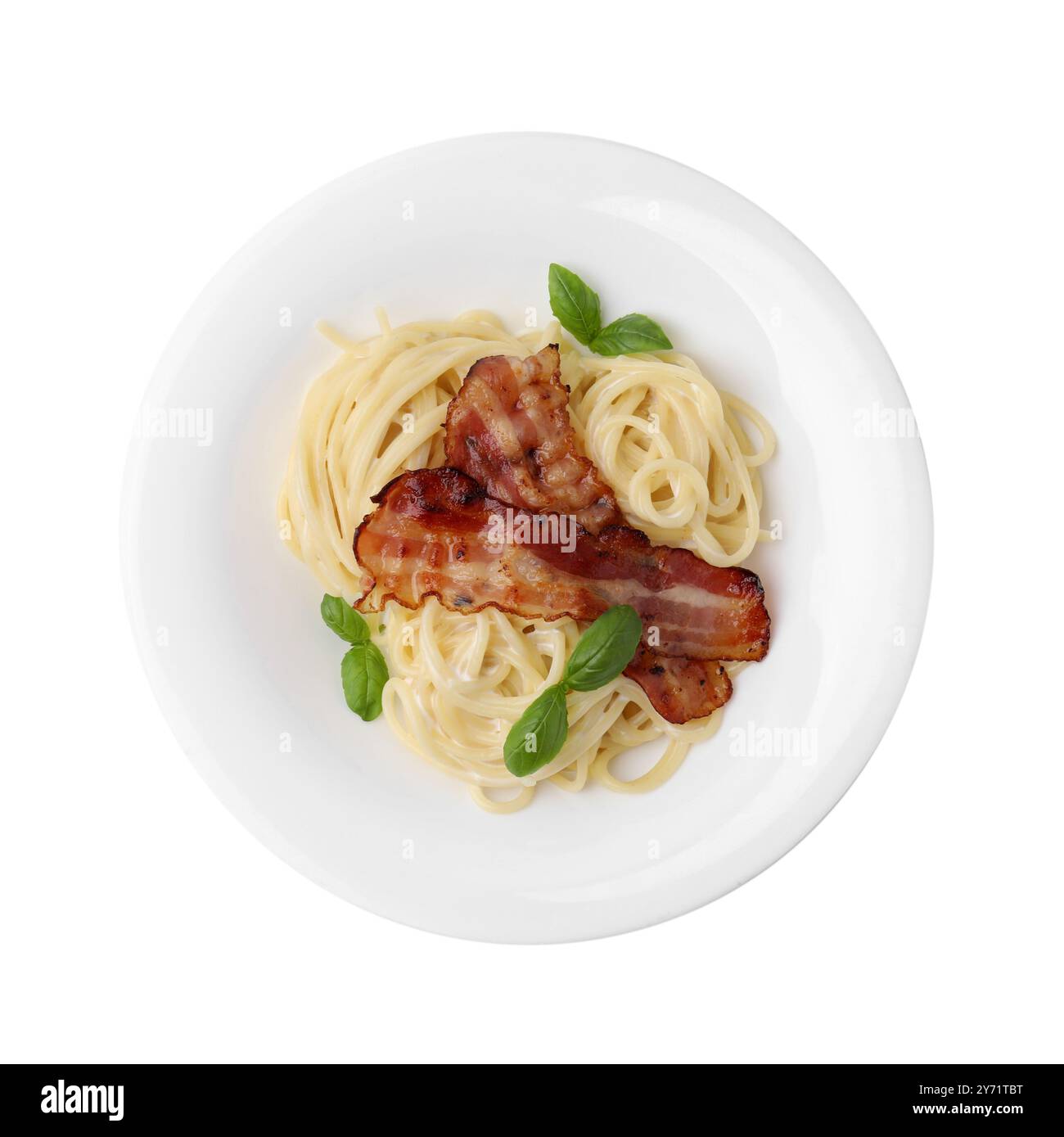 Delicious pasta Carbonara with bacon and basil isolated on white, top ...