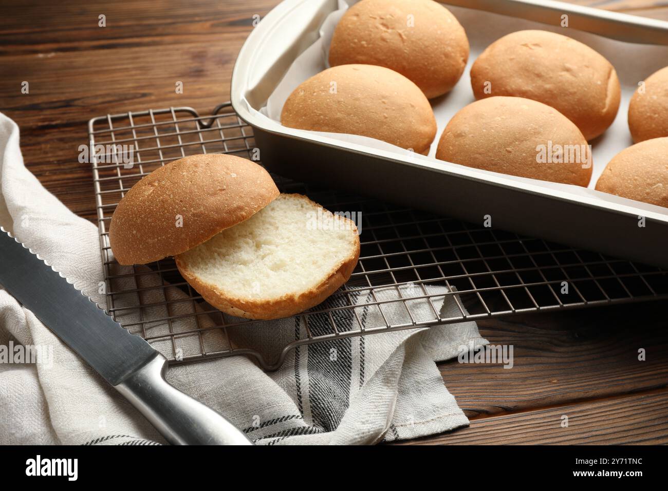 Fresh tasty buns knife hi-res stock photography and images - Alamy