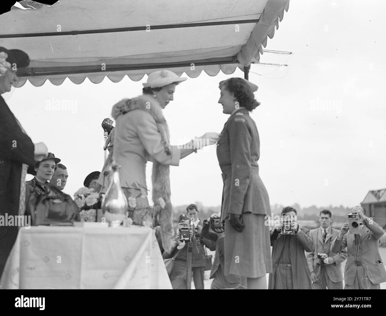 Air Girls of the Future rally at Hendon. Four girl air-cadets of the ...