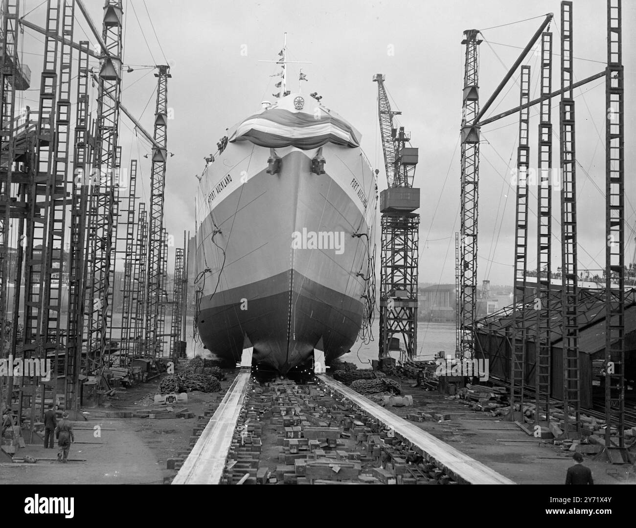 New food ship launched. The 'Port Auckland', 11,750 tons gross, gliding ...