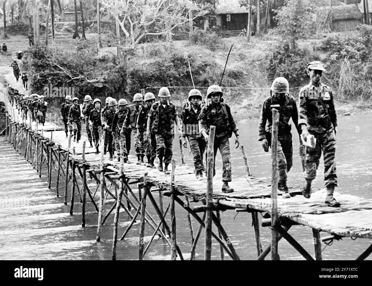 On the move Hoi-An, South Vietnam : Following a Viet Cong raid on a ...