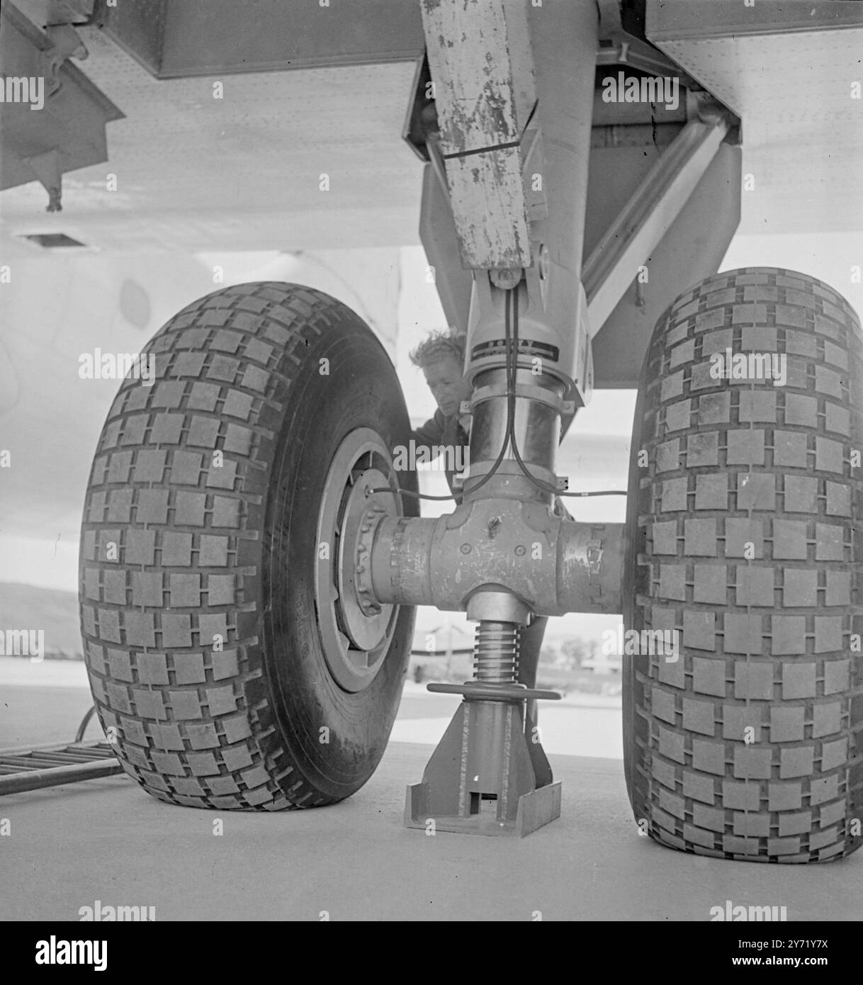 WHEEL OF AIR GIANT. This view of one of the huge undercarriage wheels ...