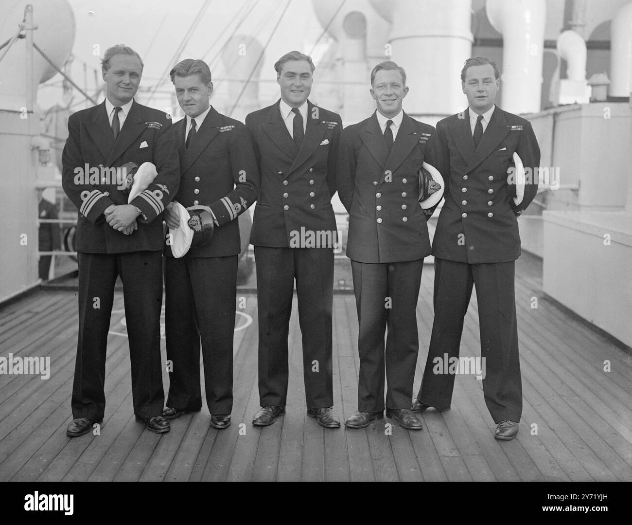 BRITISH NAVAL FLYERS ARE BACK . Five Royal flyers arrived at ...