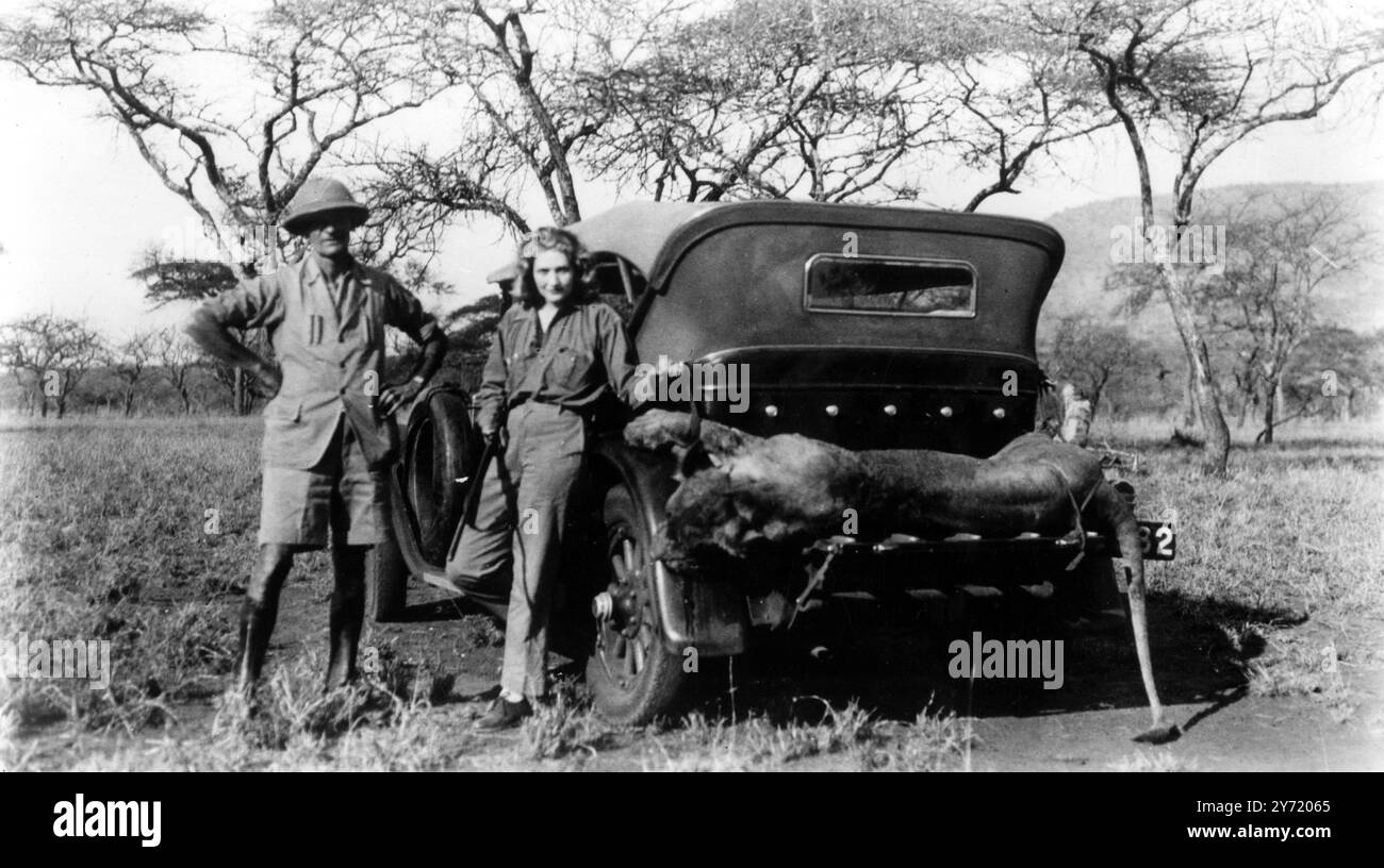 Edwina Booth with Sydney Waller and a lion shooting in Tanganyika ...