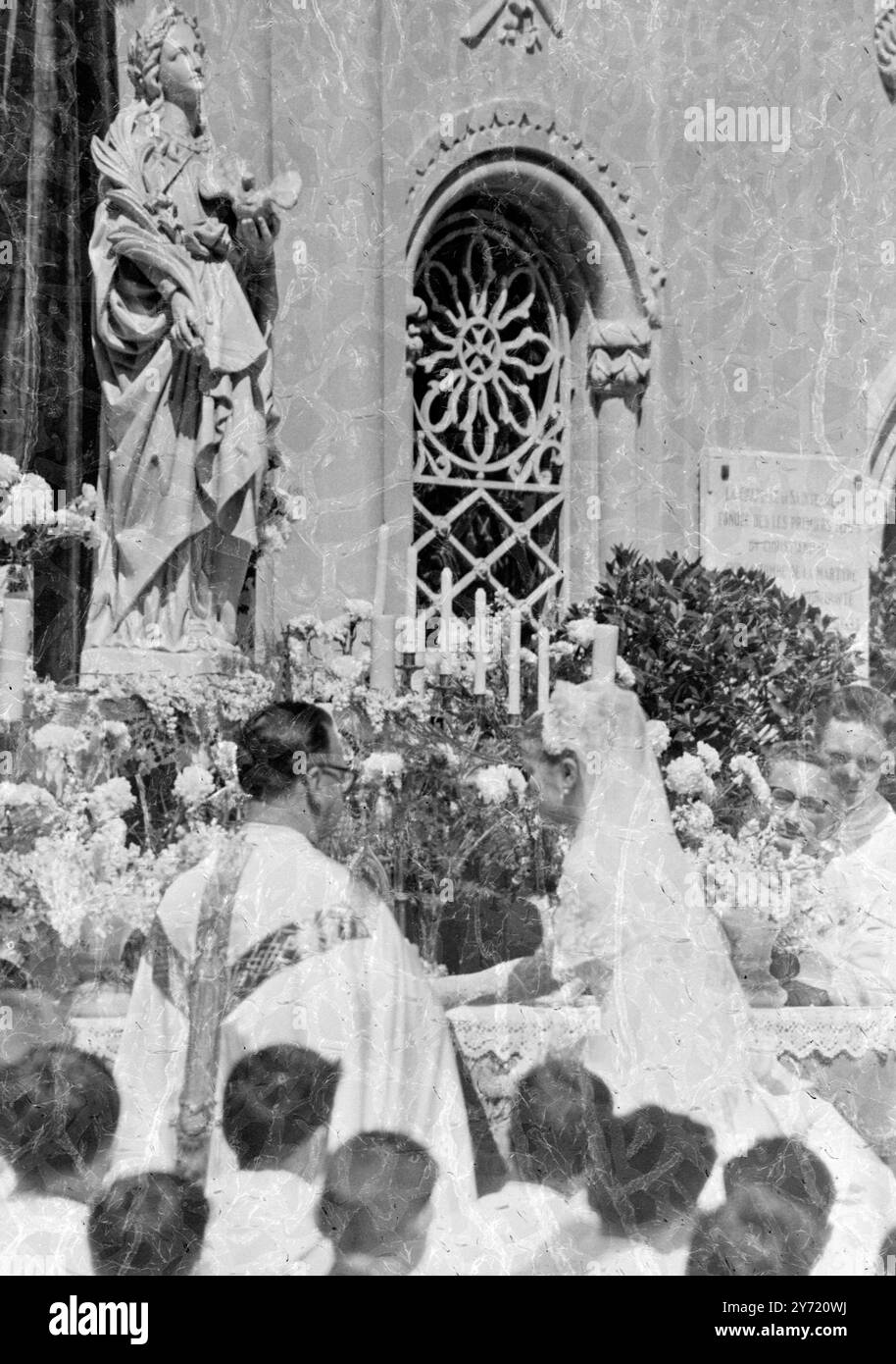 Princess Grace kneels before the Patron Saint of Monaco Photo shows ...