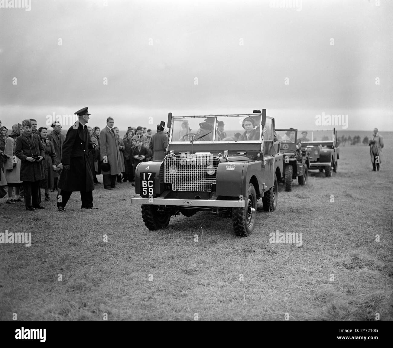 Queen Elizabeth II driving round the course in an Army Land Rover at ...