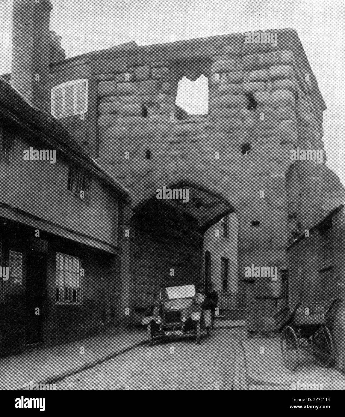 The old city of Coventry and the ancient gateway with a Standard 9'5 ...