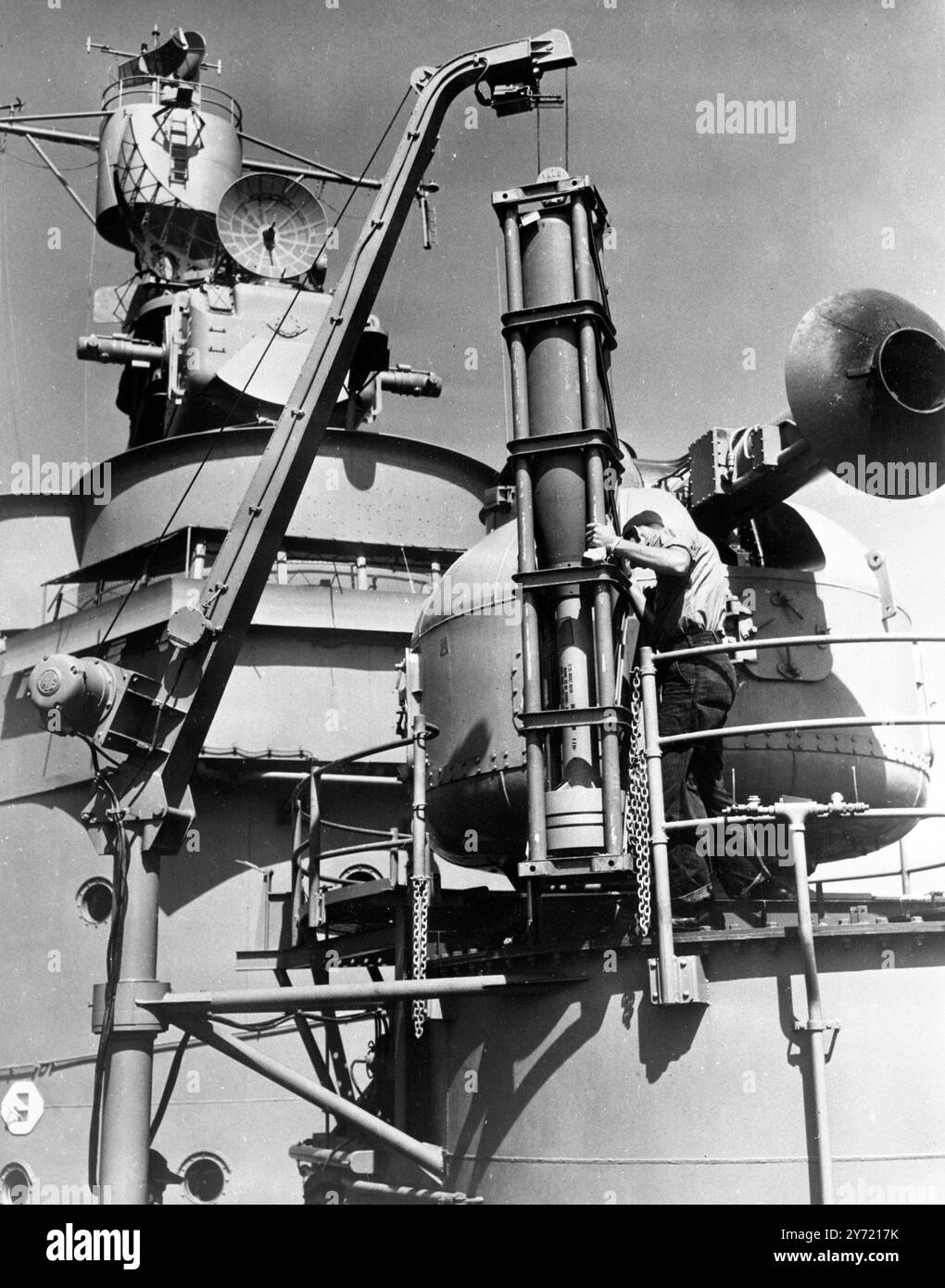 The rocket launchers being loaded with the new anti submarine weapon ...