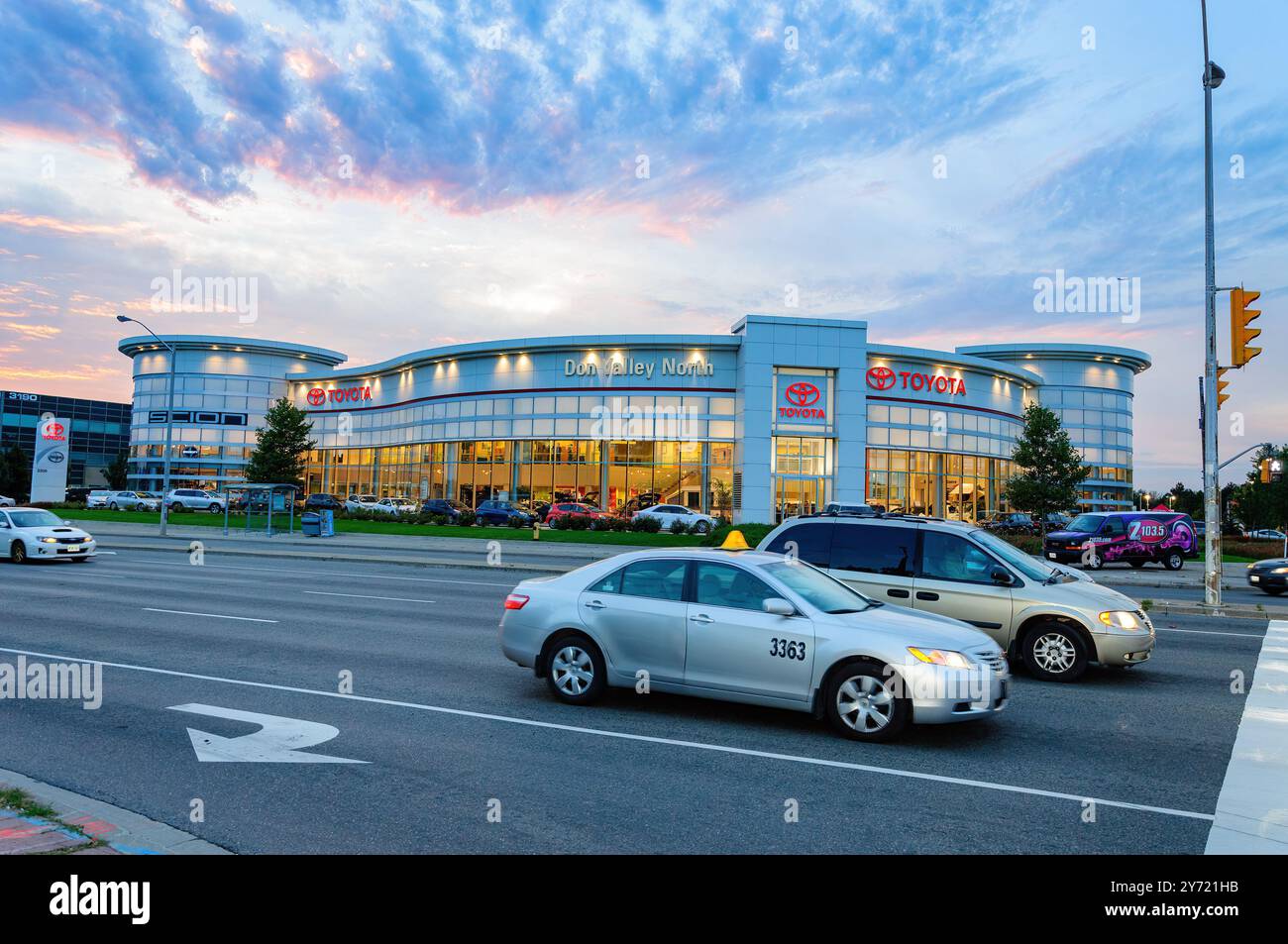 Toronto, Canada - September 5, 2024: Cars driving by a Toyota ...