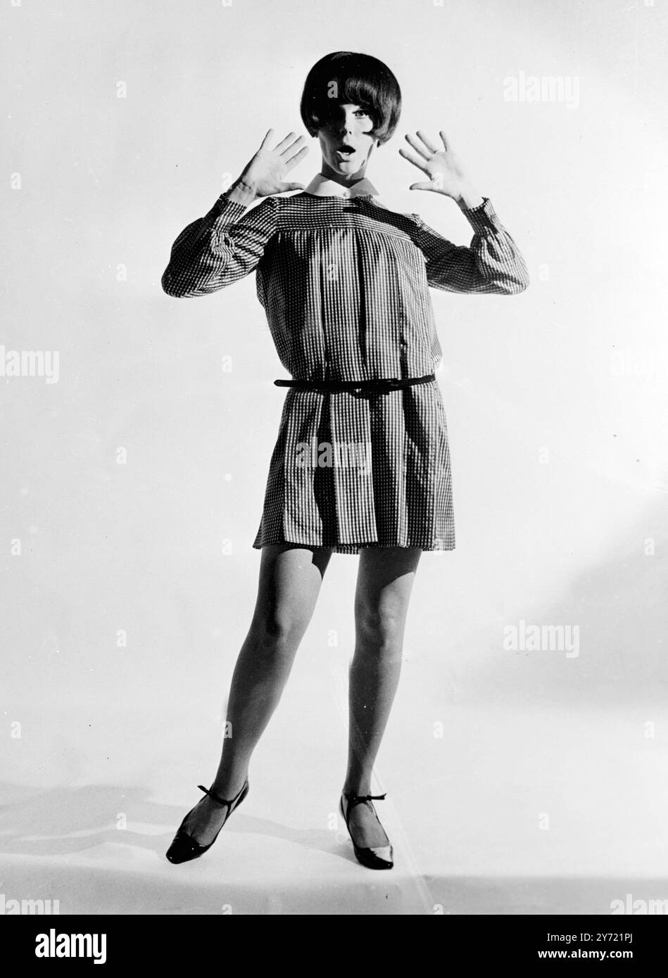 Tiziani designs A little girlish dress in silk , in the colours ...