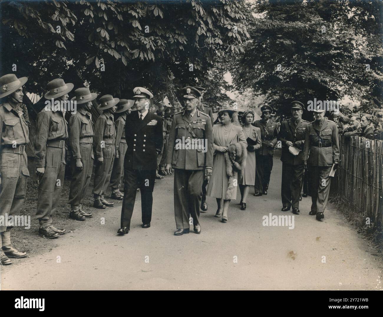 King George VI and Queen Elizabeth inspect the Nepalese Army Contingent ...