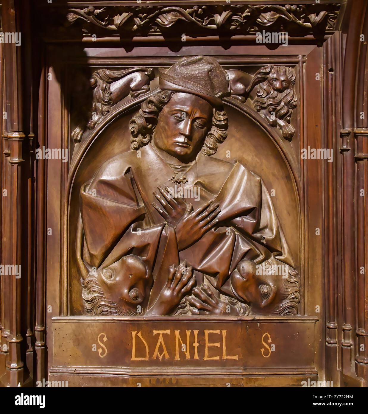 Detail close up of a panel of Daniel in the medieval carved wood choir ...