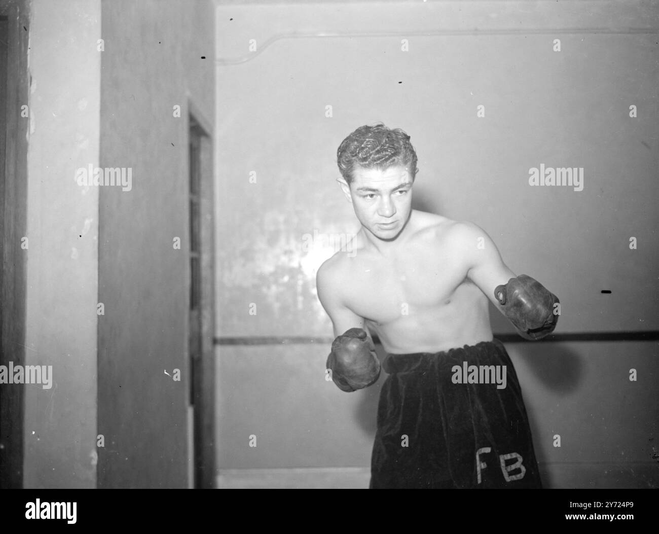 Curly haired young man Black and White Stock Photos & Images - Alamy