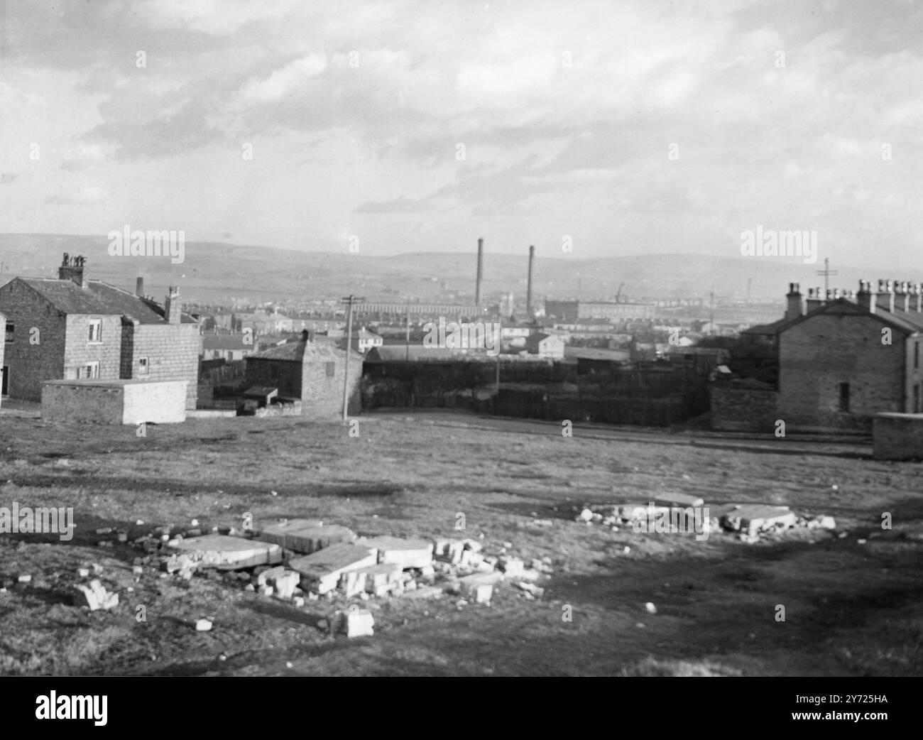 This is Rochdale , a typical Lancashire cotton town with its mill ...