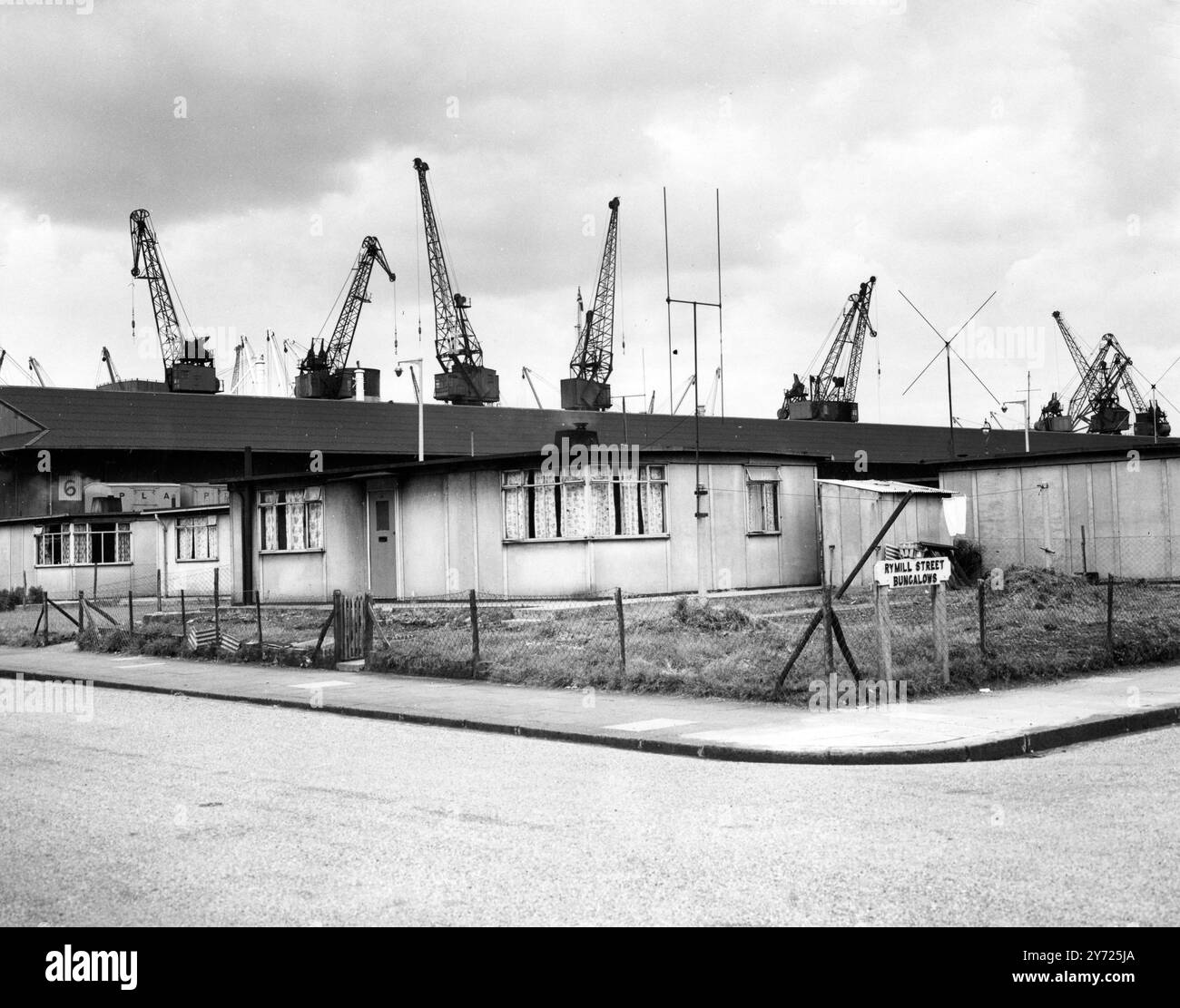 Post war prefabs and cranes 1955 Stock Photo - Alamy