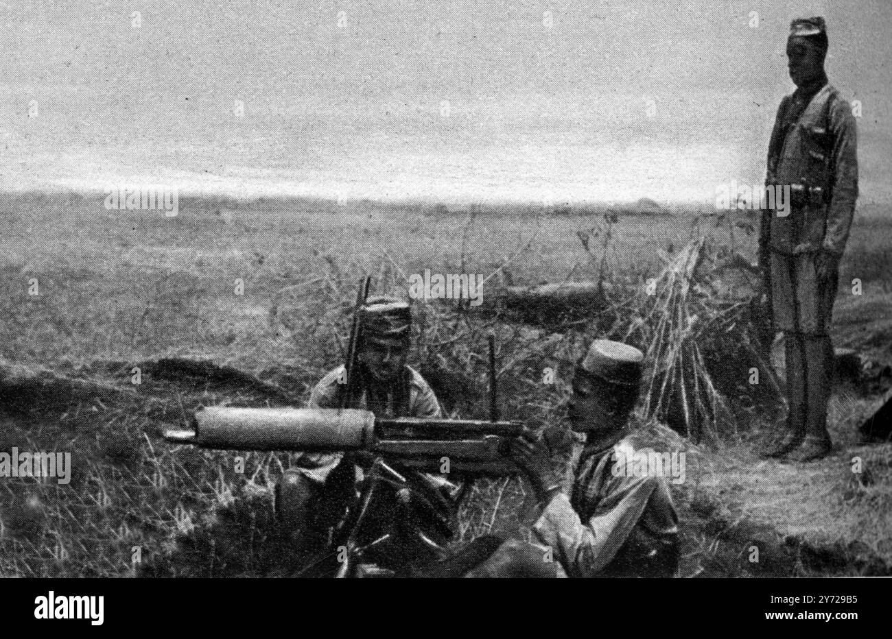 With their Maxim in camp trenches : men of the King's African Rifles ...