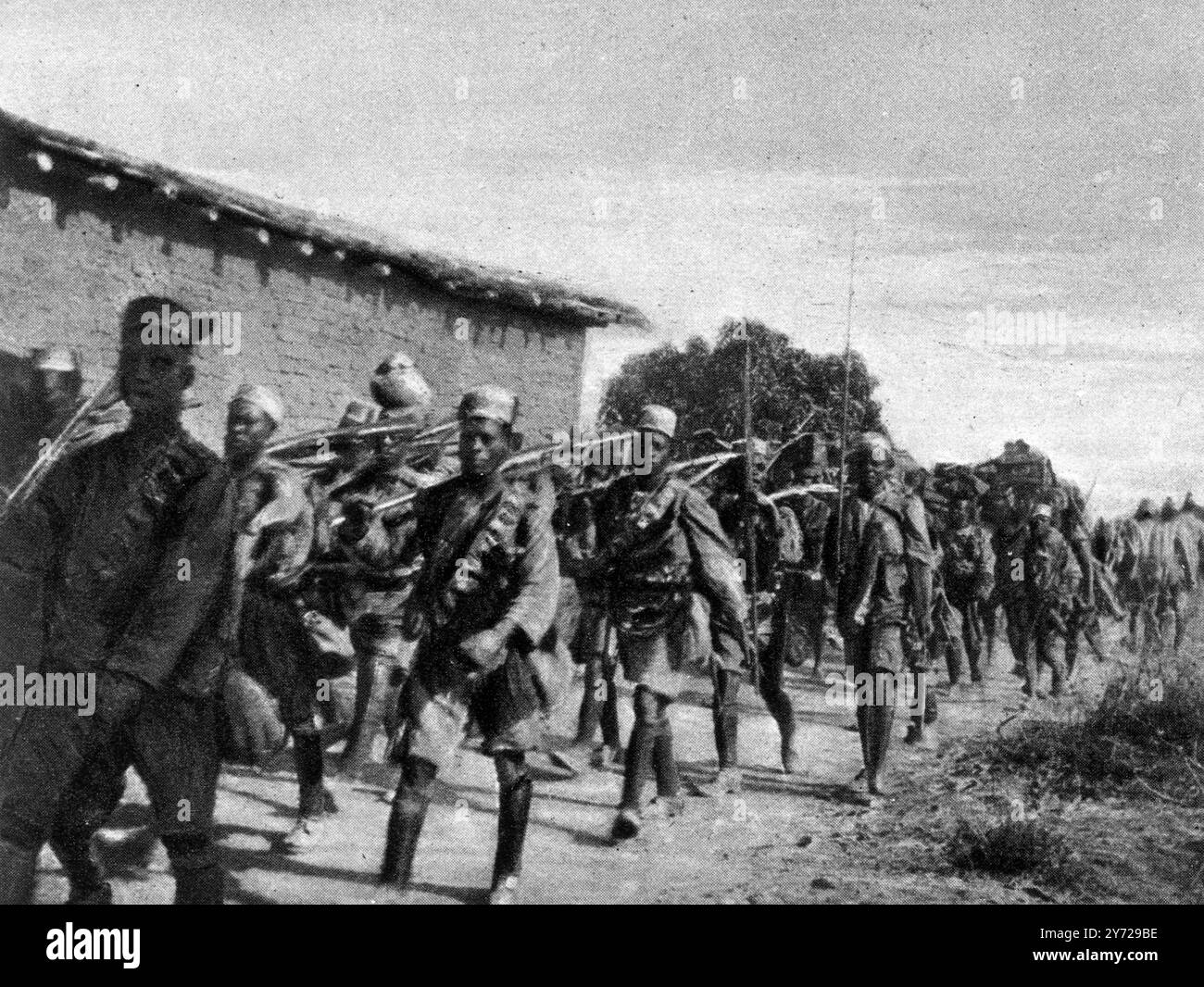 A battalion of the King's African Rifles on the march : leaving Adala ...