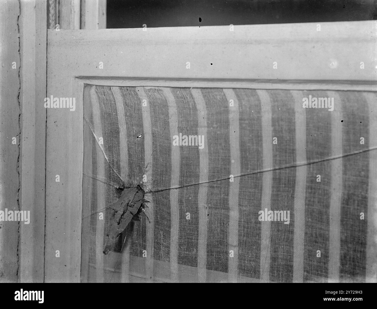 9 November 1940 Shrapnel in the window caused by during bomb damage in ...
