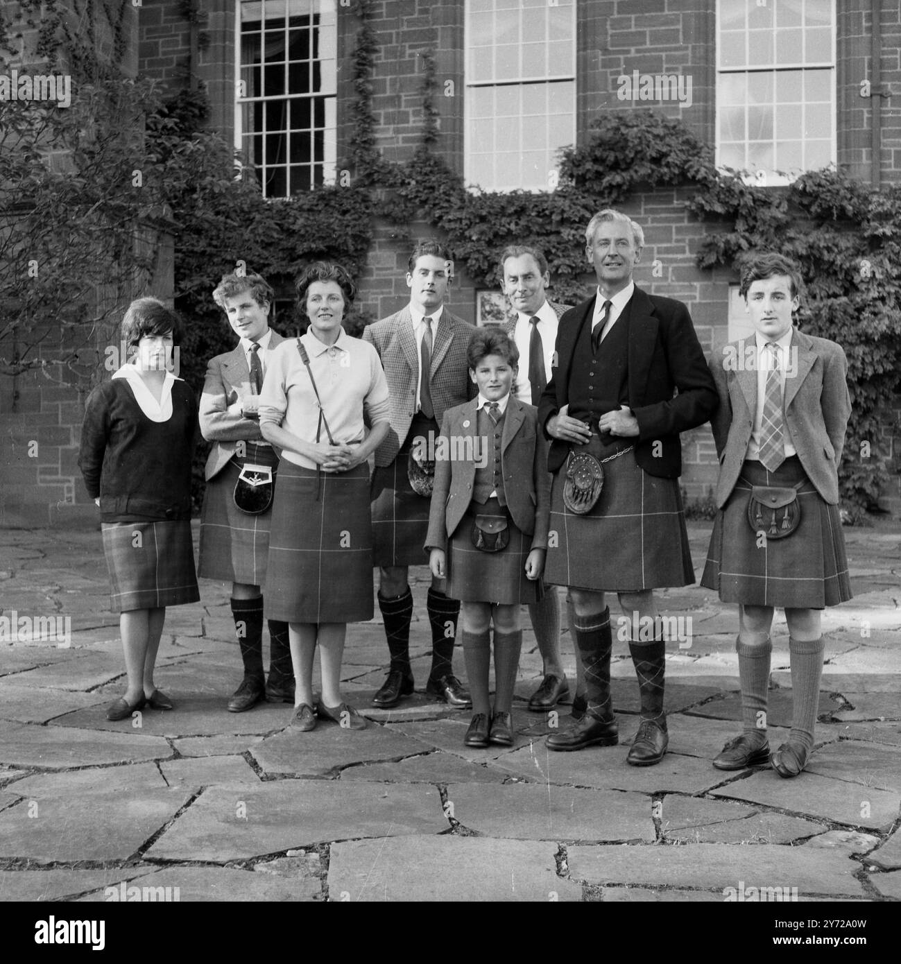 A family group on the lawn outside Beaufort Castle , near Beauly , at ...