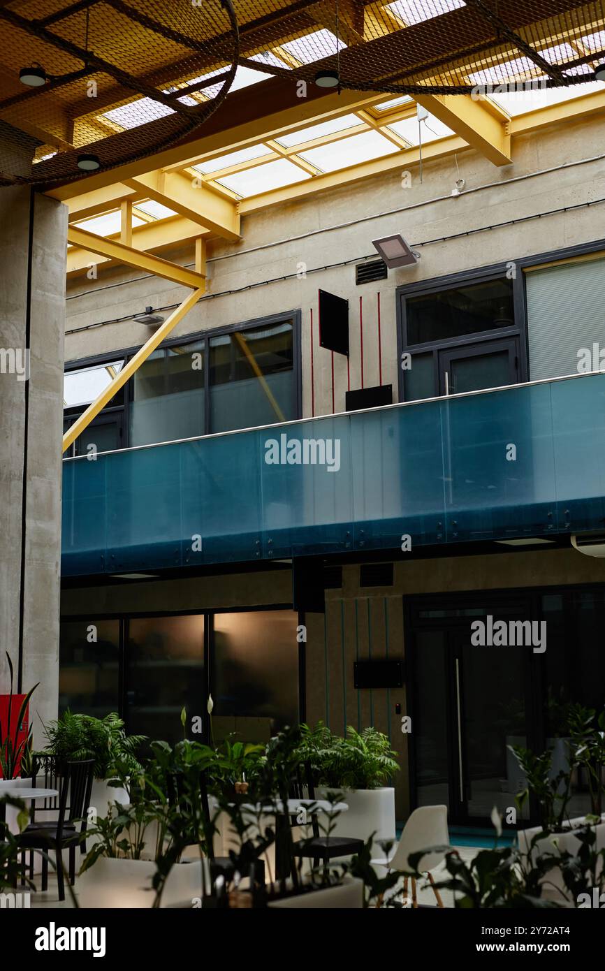 Background shot of two storey office building with offices and glass ...
