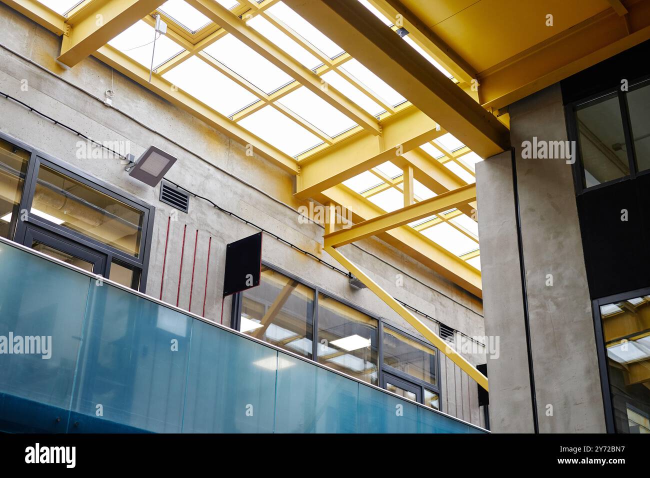 Background shot of contemporary two storey office building with offices ...