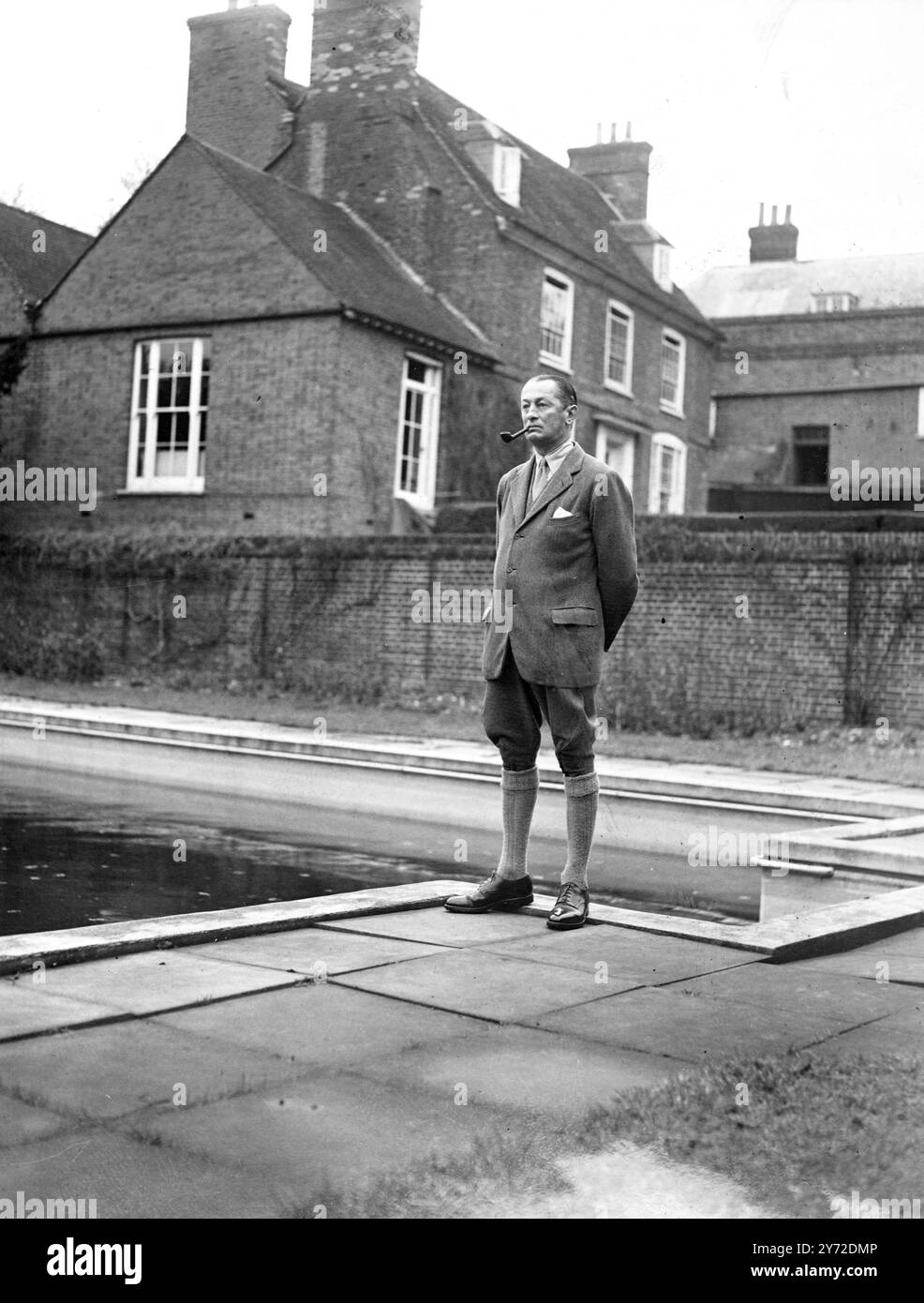 A study of Sir Humphrey poses for the camera by the swimming pool.Taken ...
