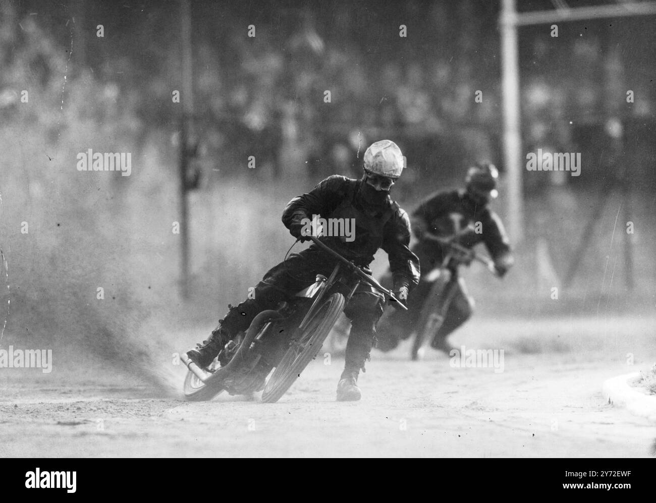 Thrills on the cinder track. 6 August 1947 Stock Photo - Alamy