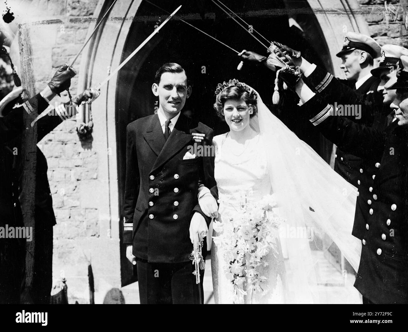 With a guard of honour formed by naval officers the bride Miss Torfrida ...