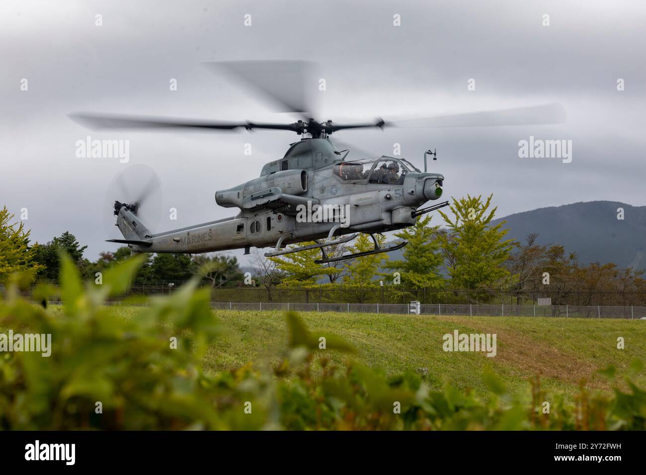 A U.S. Marine Corps AH-1Z Viper helicopter with Marine Light Attack ...